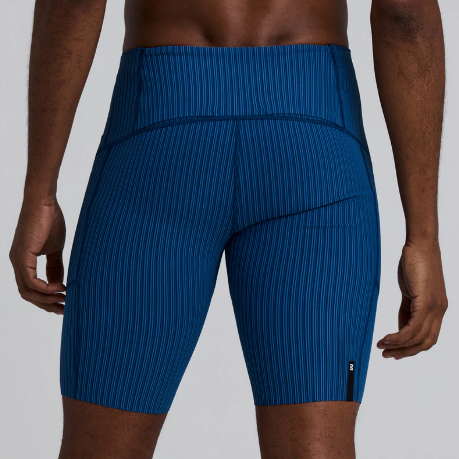 Bandit Running Striped Cadence™ 7 Pocket Lined Half Tights - Ink Blue ...